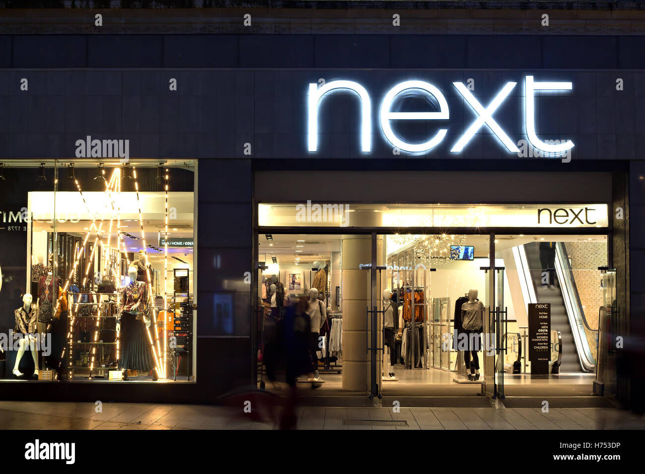 Window display at the Next store on Church St Liverpool UK at night ...