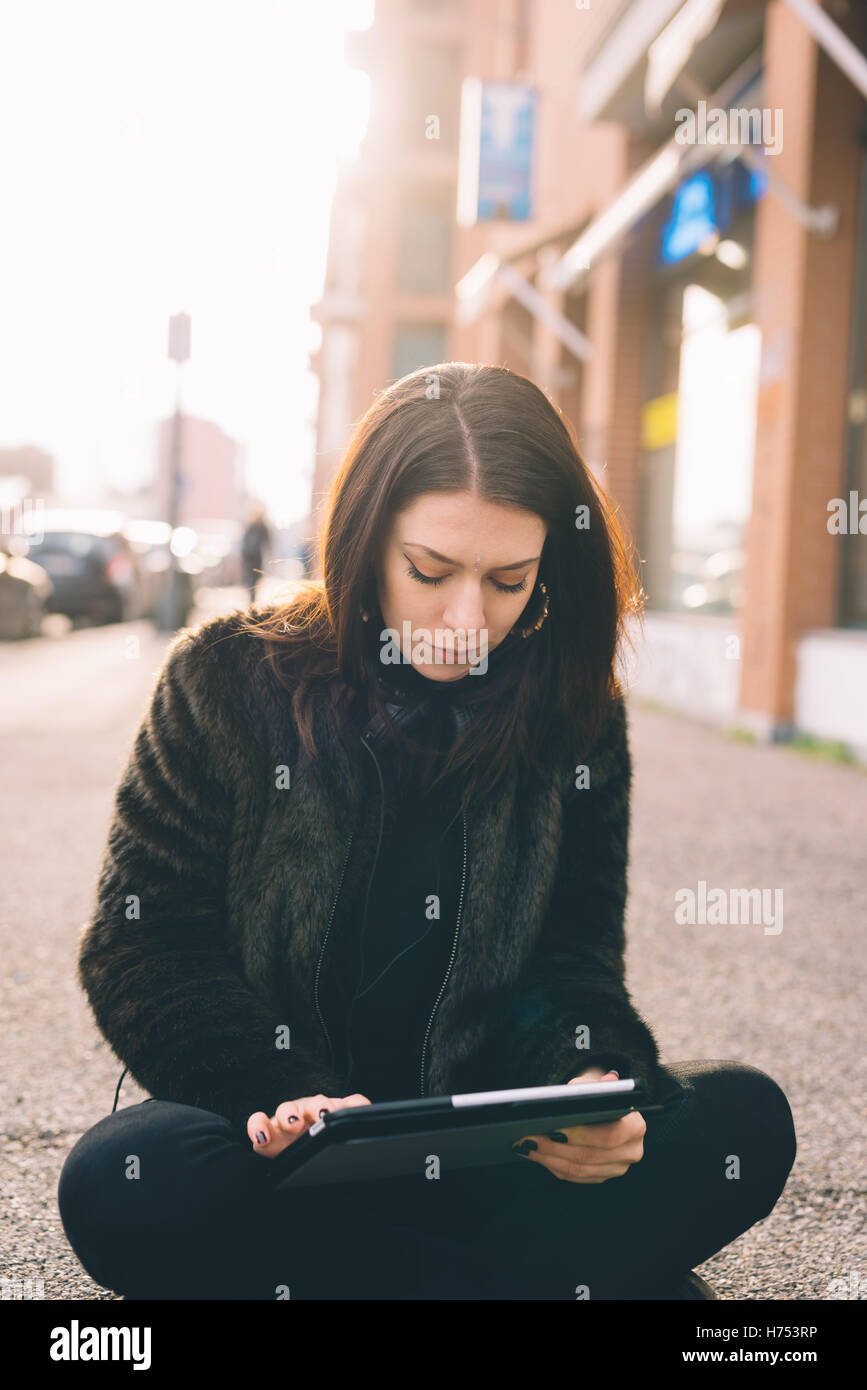 Young beautiful caucasian long brown hair woman with septum piercing ...