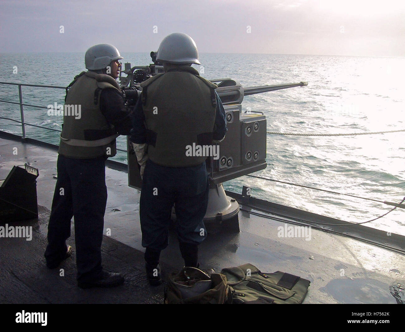 30th January 2003 Crew members man a .50 calibre machine-gun on the the ...