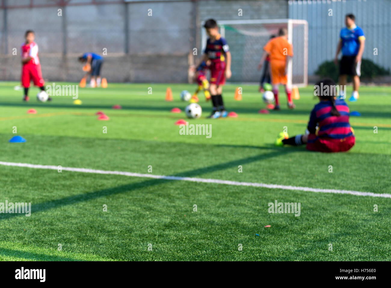 Blurred image of Children Training in Soccer academy Stock Photo - Alamy