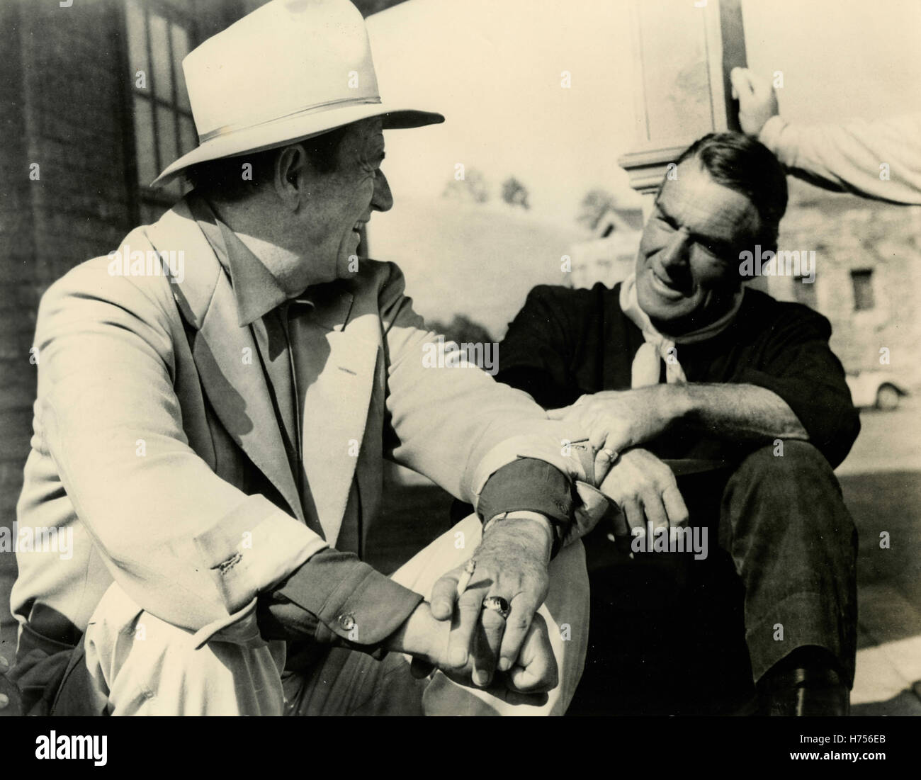 Randolph Scott and John Wayne American actors during the filming of Seven Men from now, USA 1956 ...