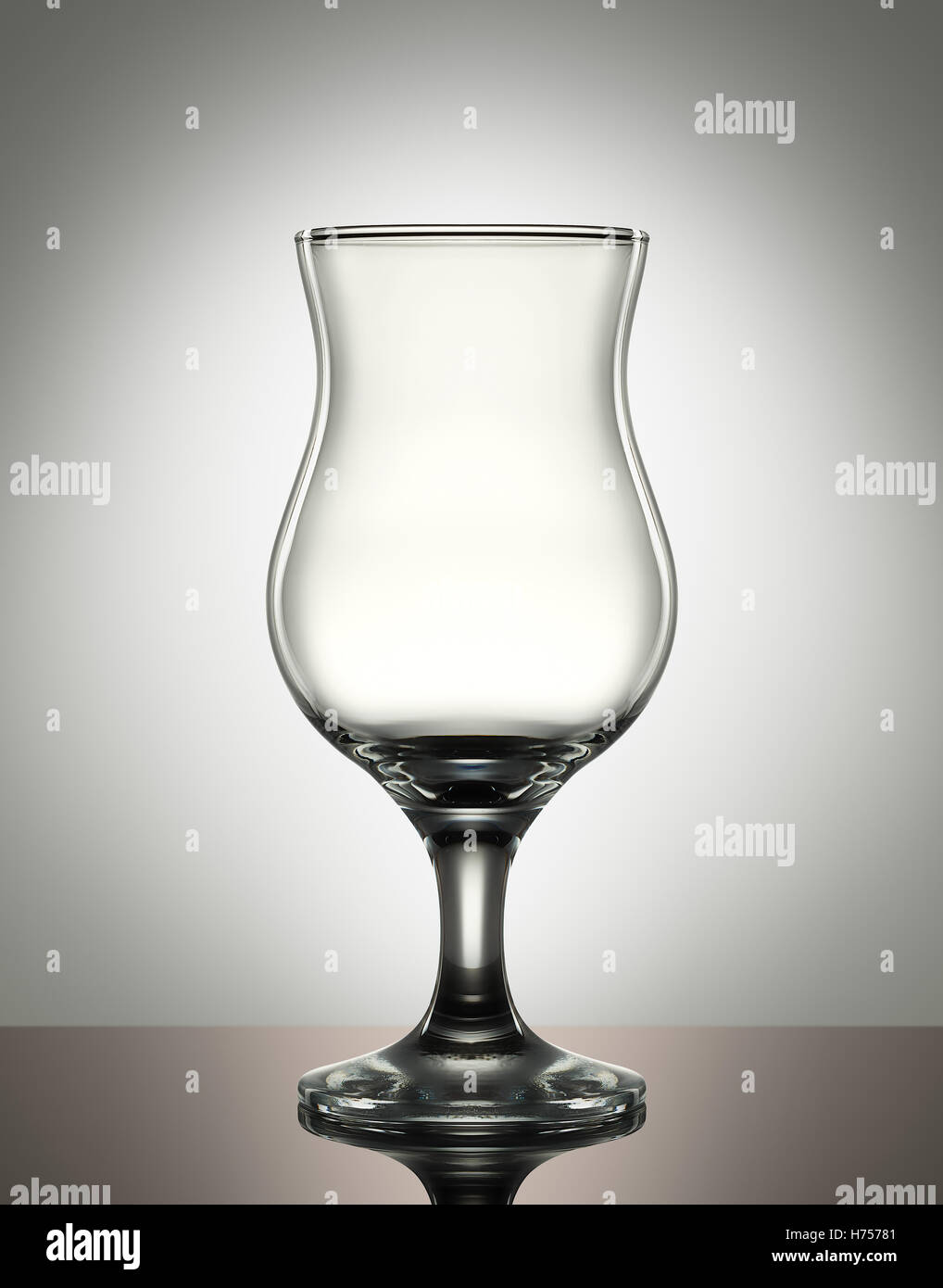 Empty cocktail glass on white Stock Photo - Alamy