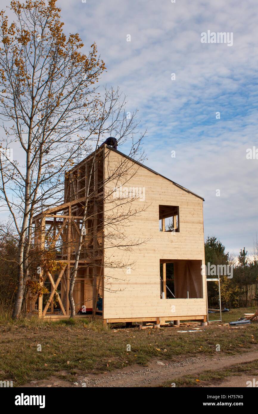 Construction of ecological house. External work on the building ...