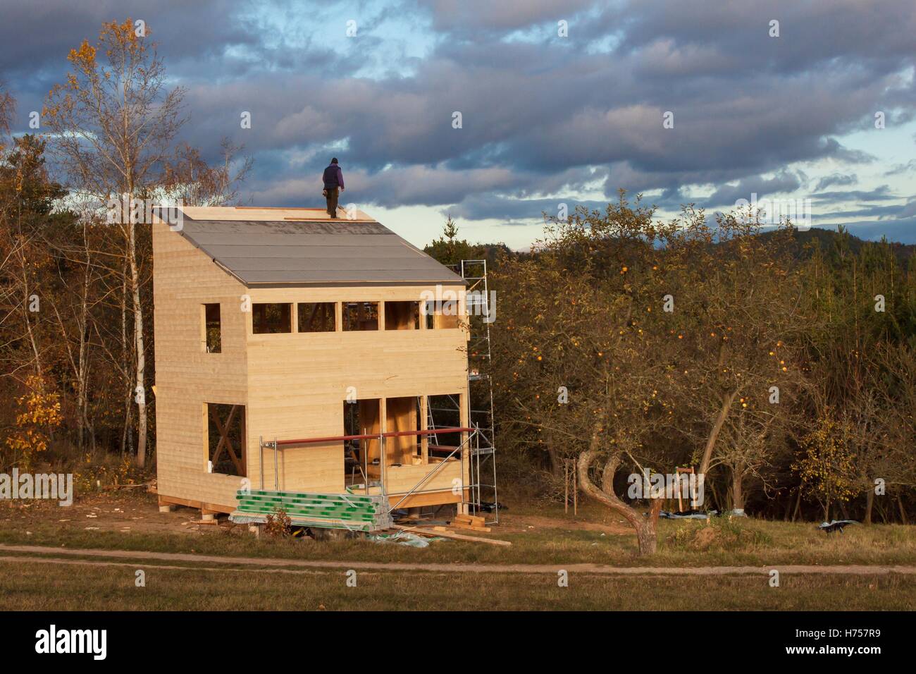 Construction of ecological house. External work on the building ...
