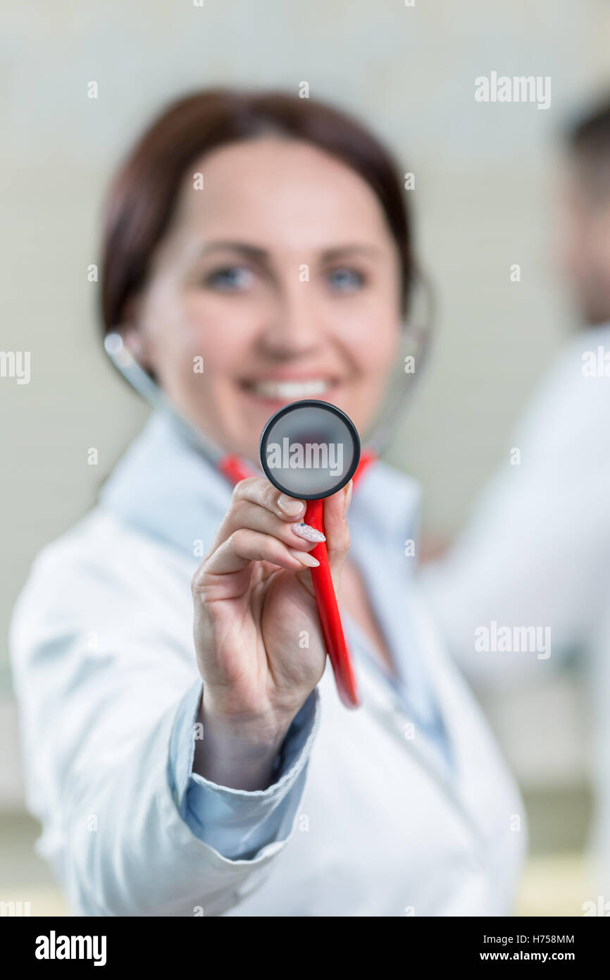 Portrait of woman doctor at hospital corridor Stock Photo - Alamy