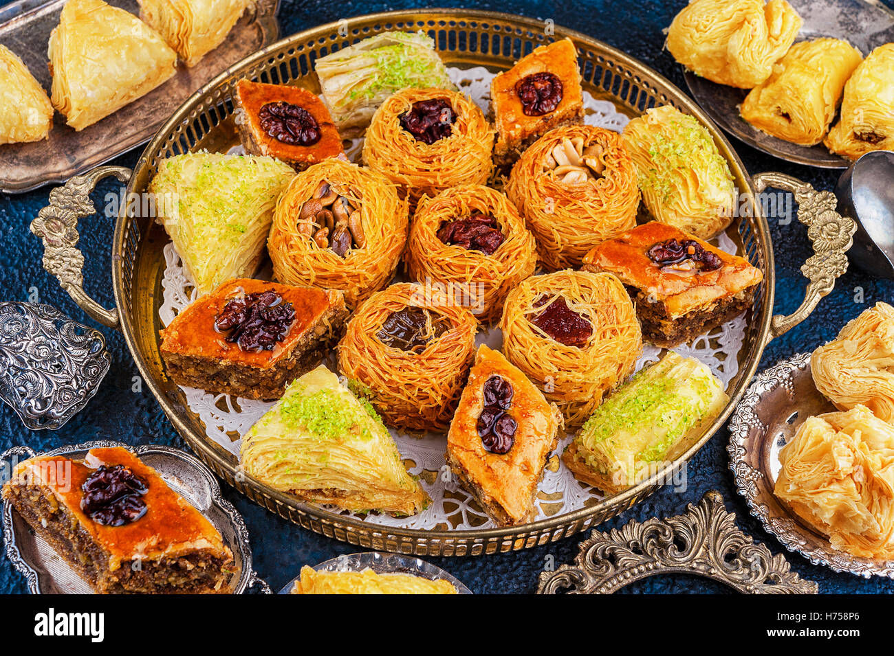 Set oriental sweets on a round tray Stock Photo - Alamy