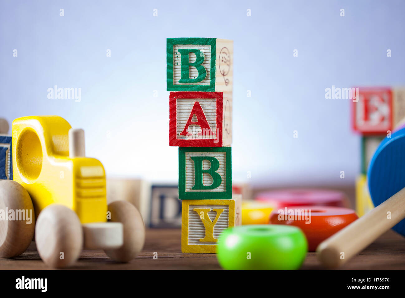 Children's World toy on a wooden background. Studio shot] Stock Photo ...