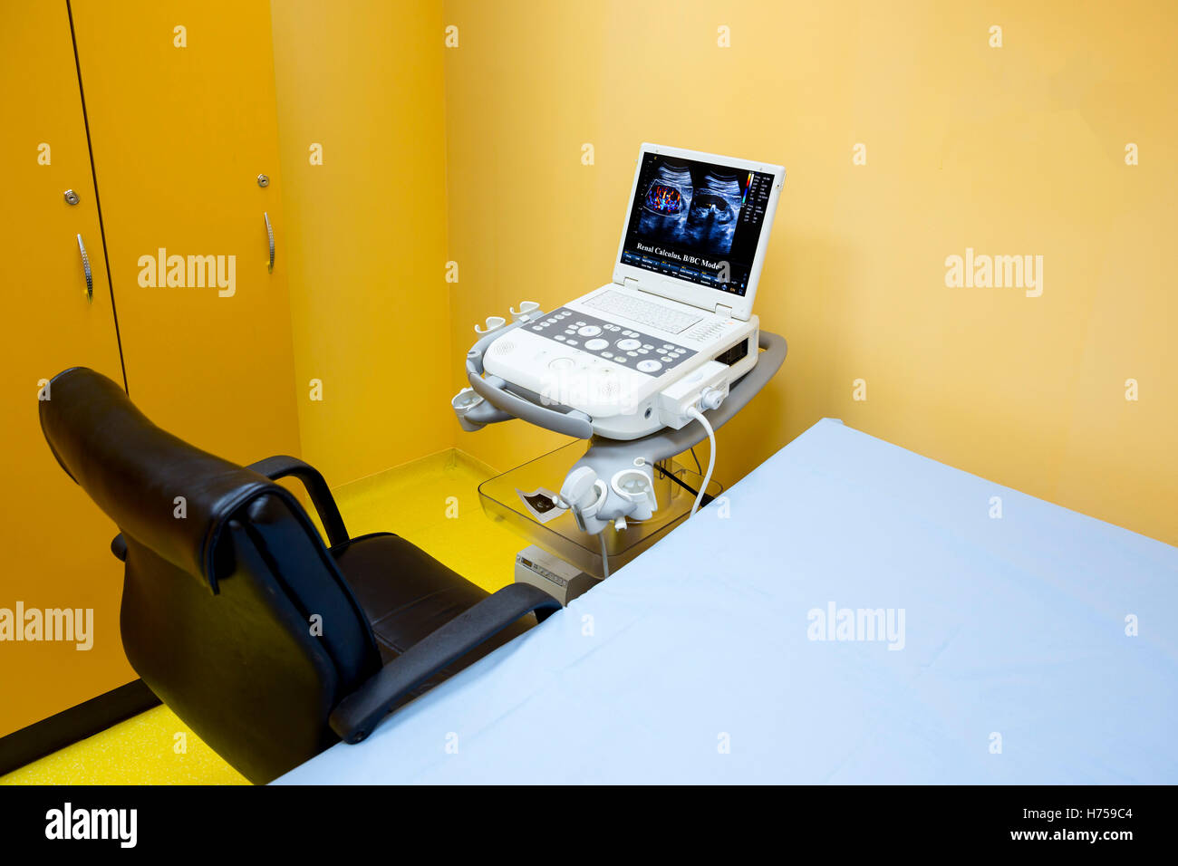 Interior of examination room with ultrasonography machine in hospital ...