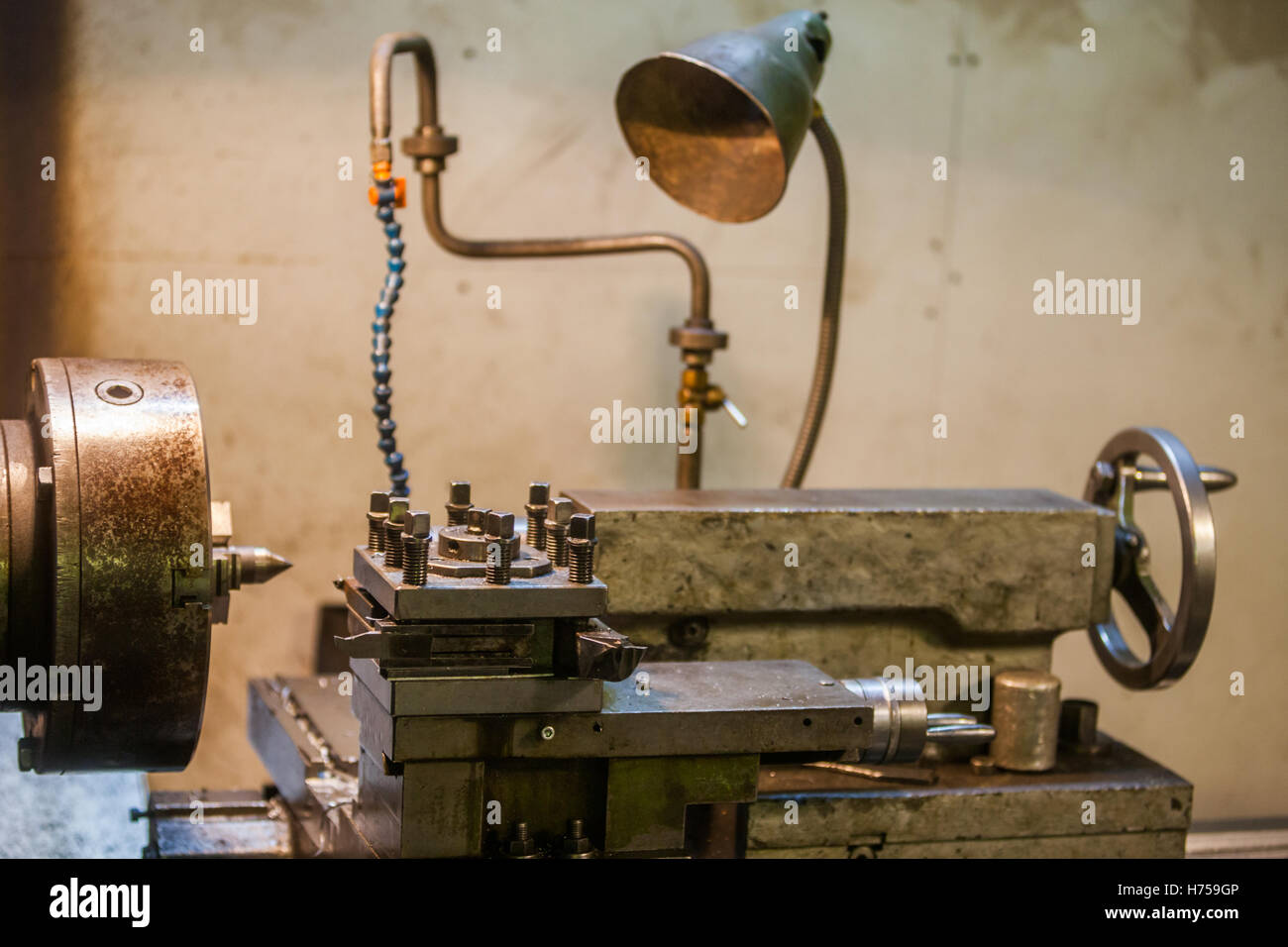 Color image of an old lathe in a workshop Stock Photo - Alamy
