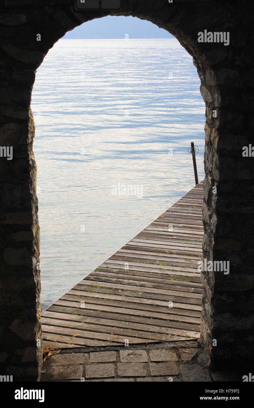 Ancient stone door on Garda lake in northern Italy Stock Photo - Alamy