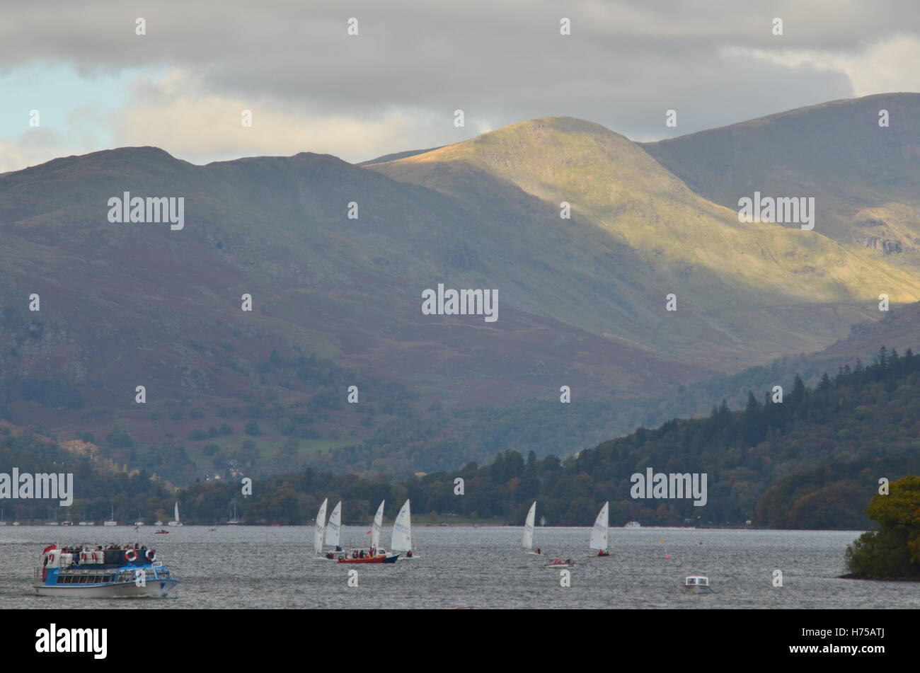 One illuminated mountain in Windermere, Lake District, England, UK ...
