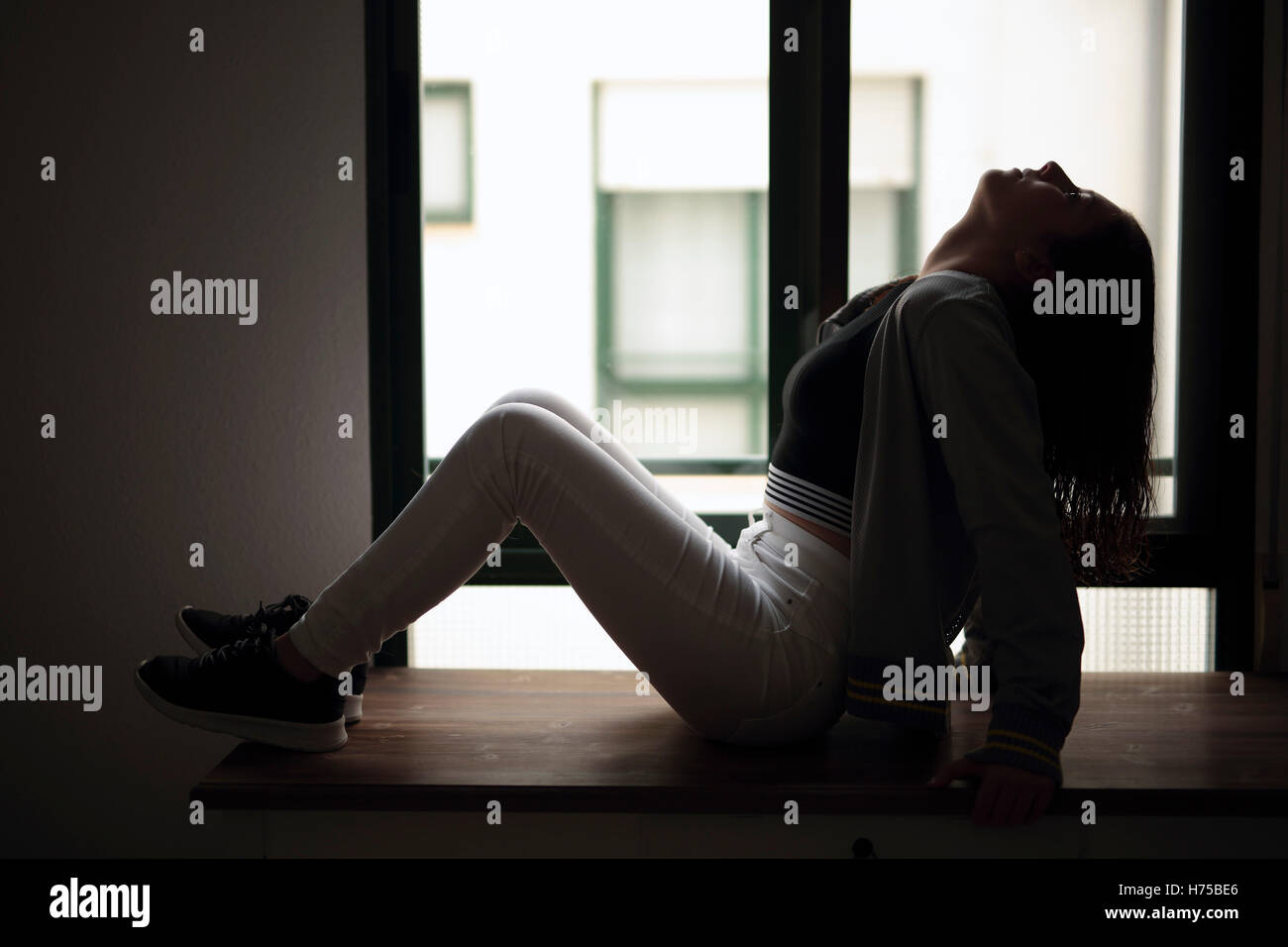 Portrait of girl with natural light to backlight. horizontal shooting ...