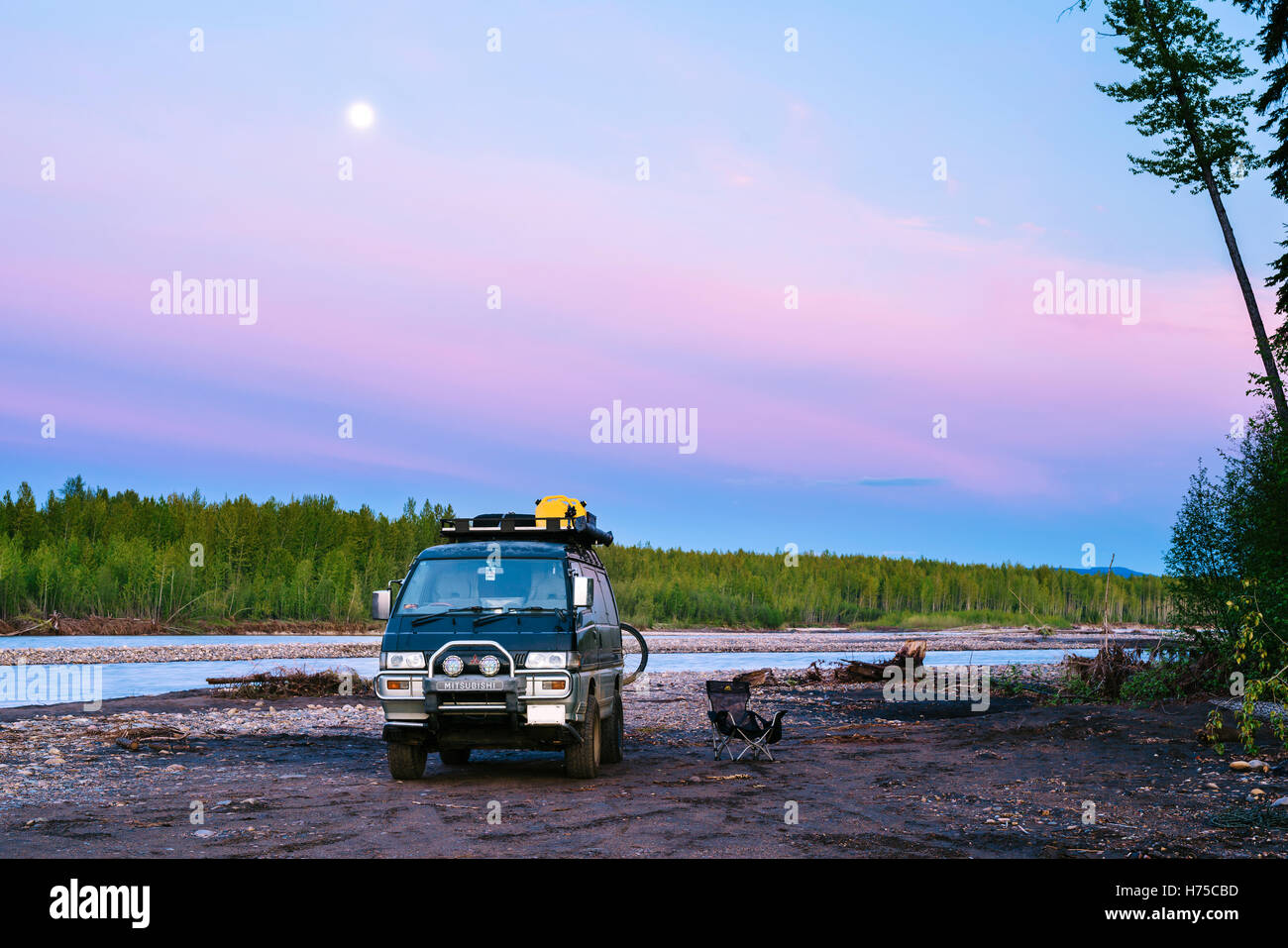 A Mitsubishi Delica L300 campervan parked beside the Muskwa River in ...