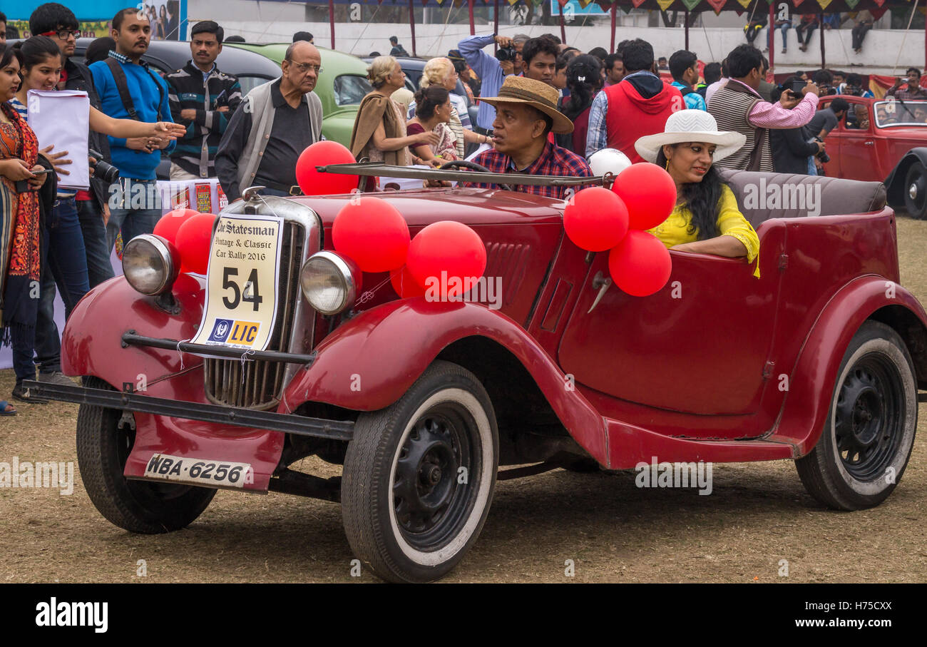 An aged couple drives their Austin vintage car after flag off at the ...