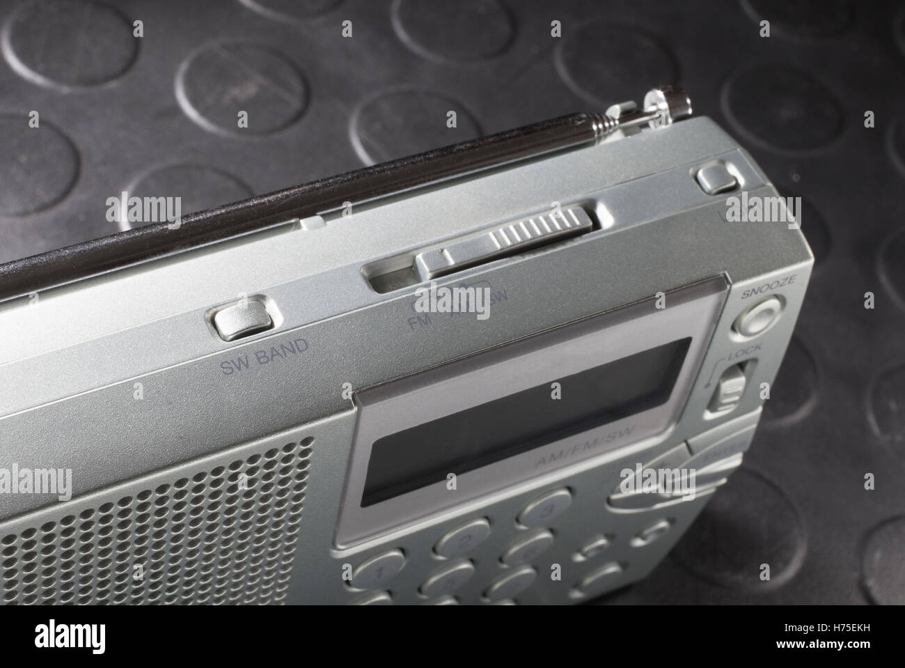 Switches on a radio that runs on batteries that allows it to go from ...