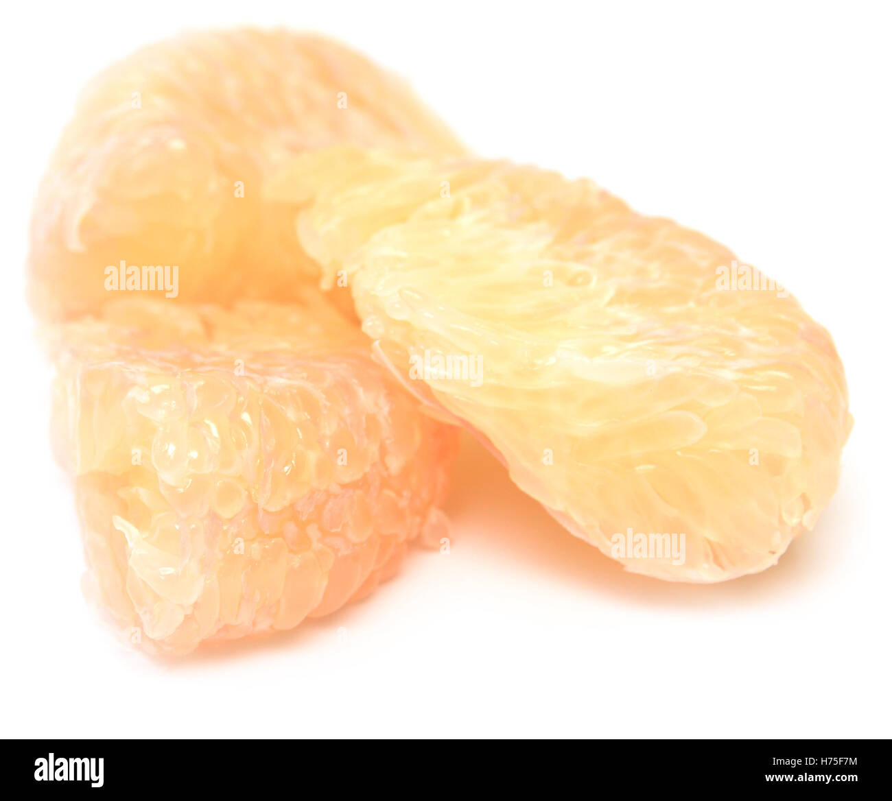 pieces of ripe pomelo isolated on white background Stock Photo - Alamy