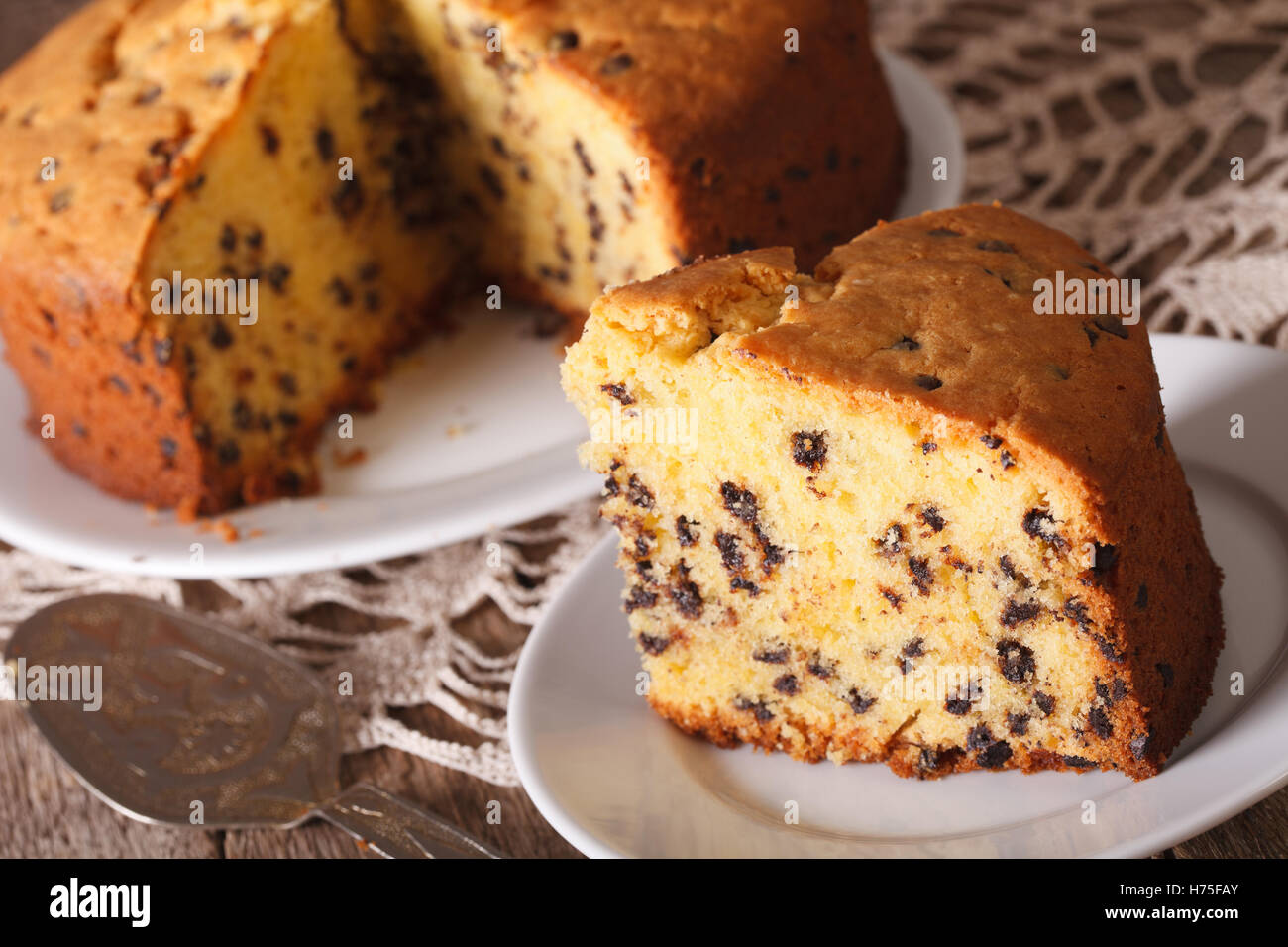 Tasty slice of German kuhen with chocolate on a plate macro. horizontal ...