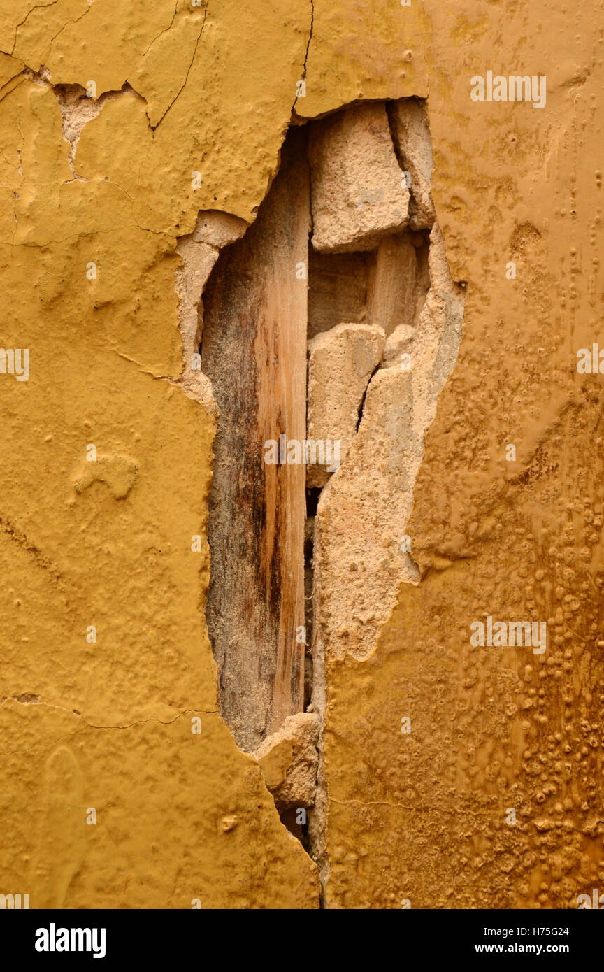 Breakaway plaster on the inside wall of the old house Stock Photo - Alamy