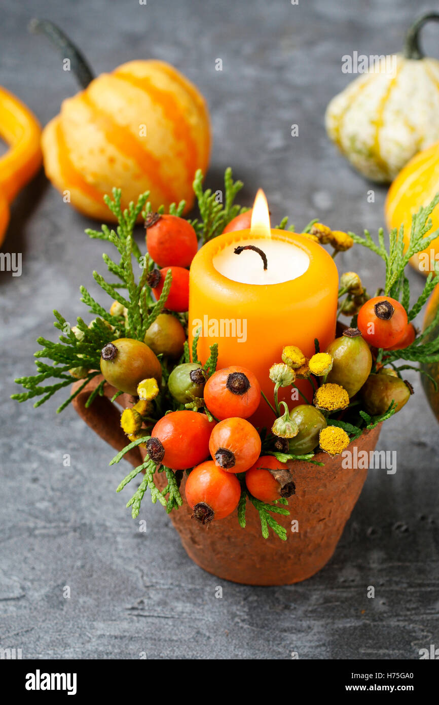 Beautiful decoration with candle and autumn plants. Table decor Stock ...