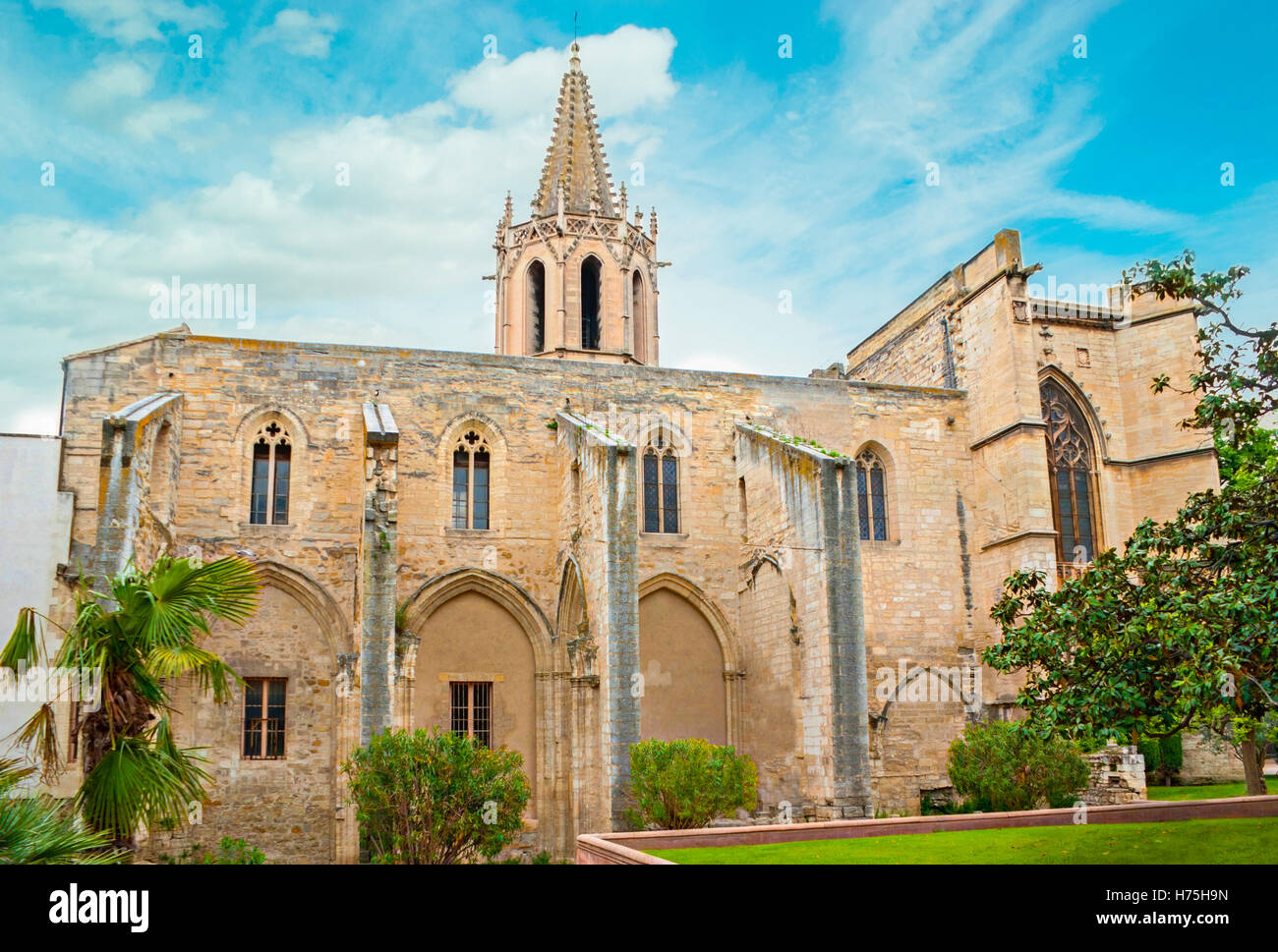Old medieval church with small garden around it Stock Photo - Alamy