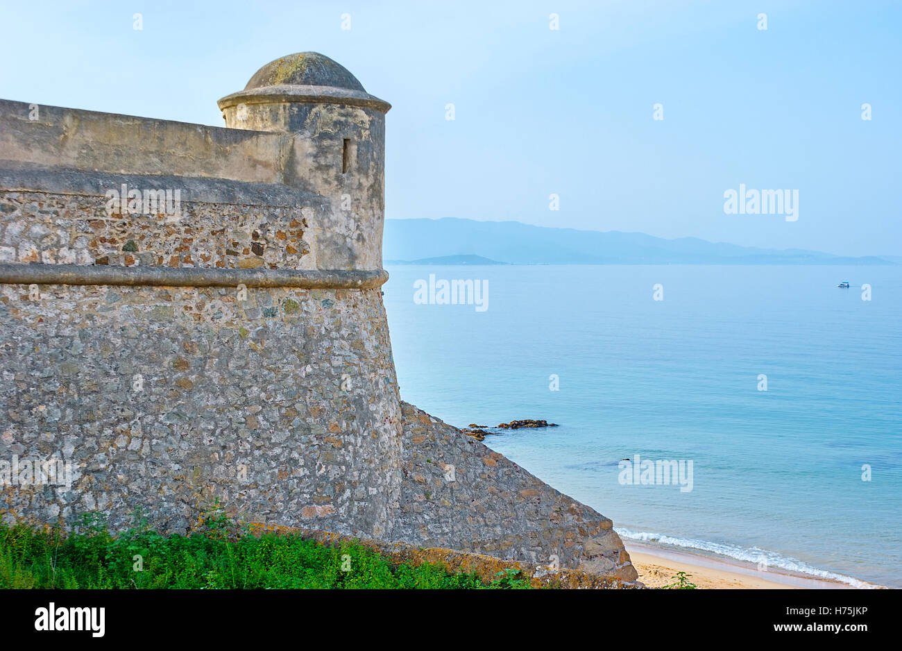 The Citadel walls neighbors with the central beach, Ajaccio, Corsica ...