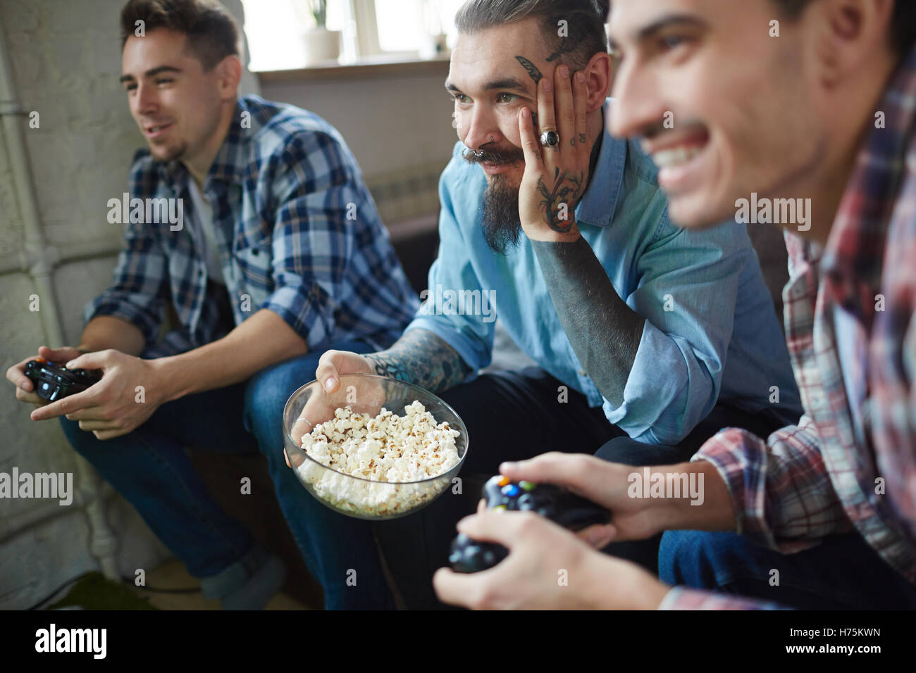 Watching video game Stock Photo - Alamy