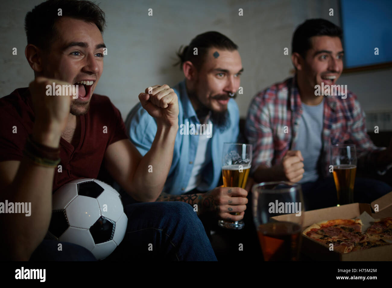 Group of people at night hi-res stock photography and images - Alamy