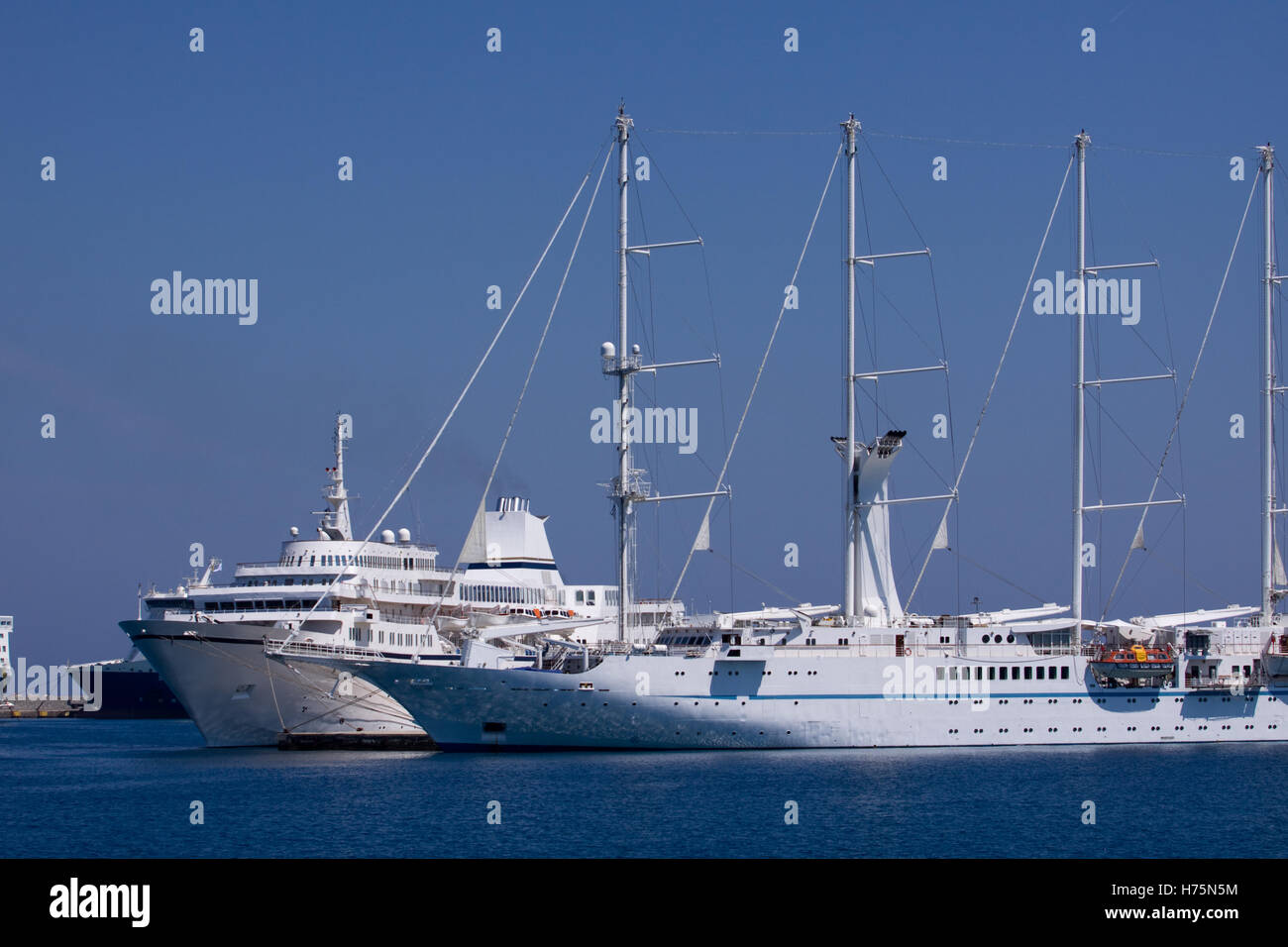 boats docked in the harbor of rodos Stock Photo - Alamy