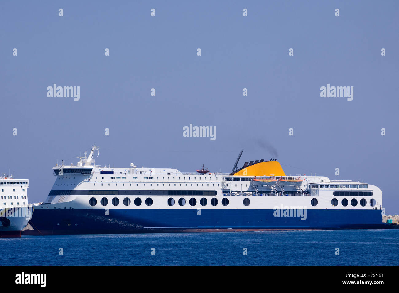 boats docked in the harbor of rodos Stock Photo - Alamy