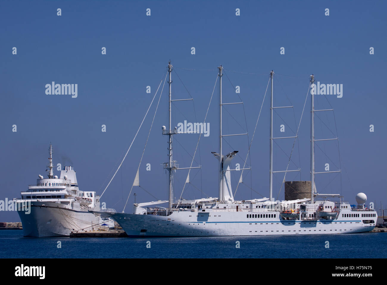 boats docked in the harbor of rodos Stock Photo - Alamy