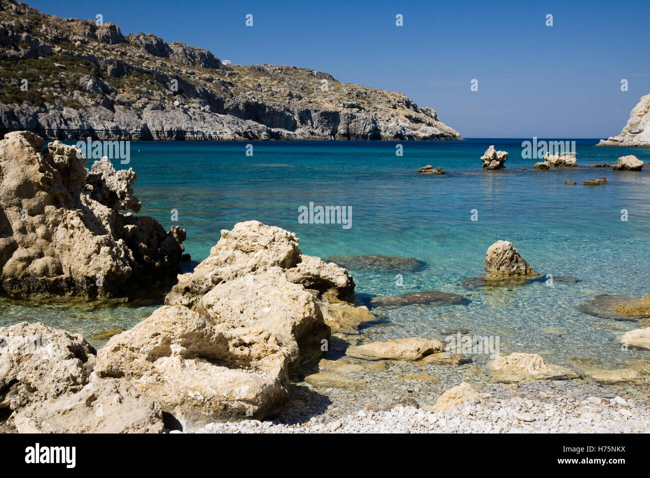 blue sea and beach of the isle of rodos in greece Stock Photo - Alamy