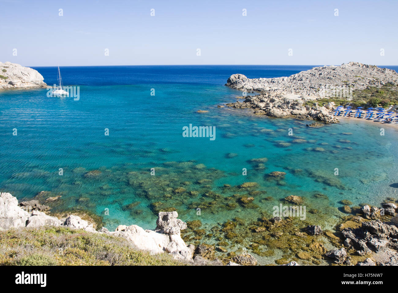 blue sea and beach of the isle of rodos in greece Stock Photo - Alamy