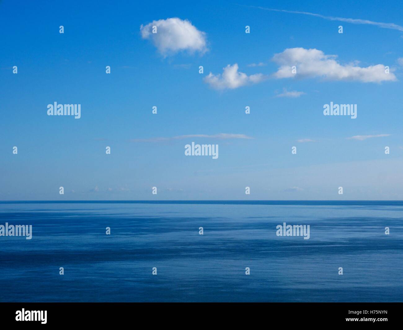 Sea and sky with clouds Stock Photo - Alamy