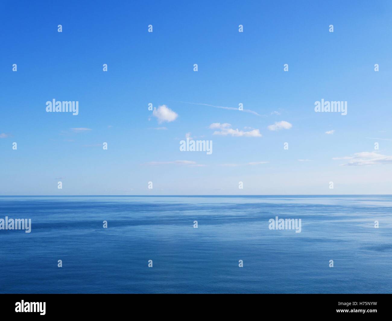 Sea and sky with clouds Stock Photo - Alamy