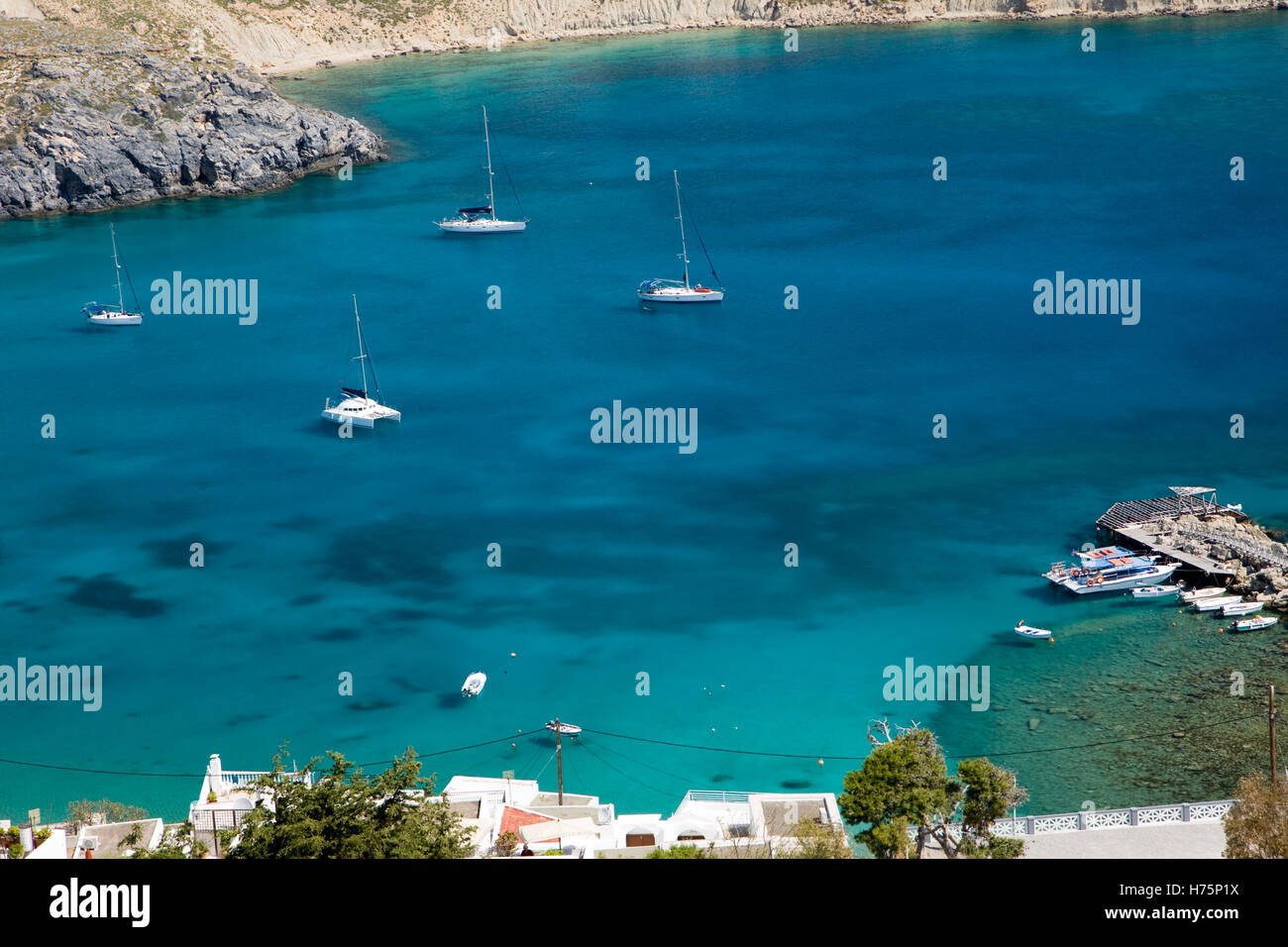 blue sea and beach of the isle of rodos in greece Stock Photo - Alamy