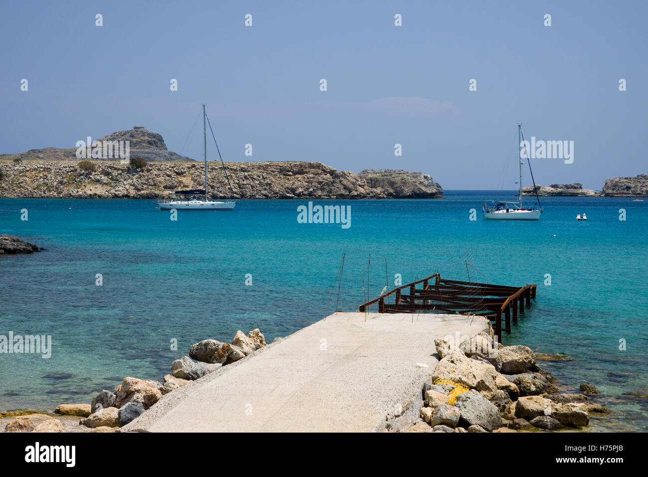 beach and sea of rodos in greece Stock Photo - Alamy