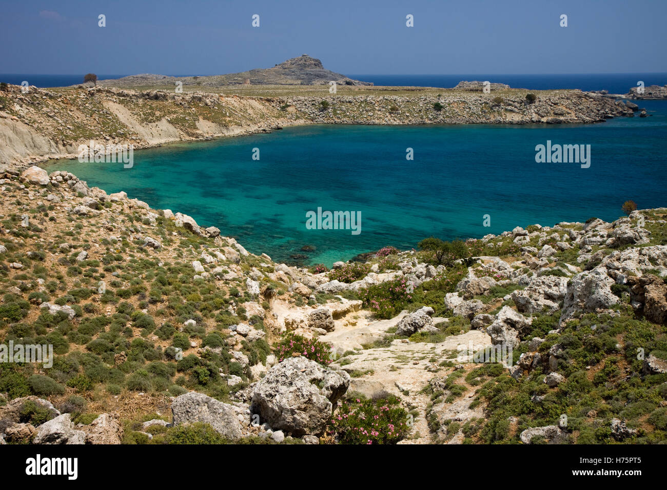 blue sea and beach of the isle of rodos in greece Stock Photo - Alamy