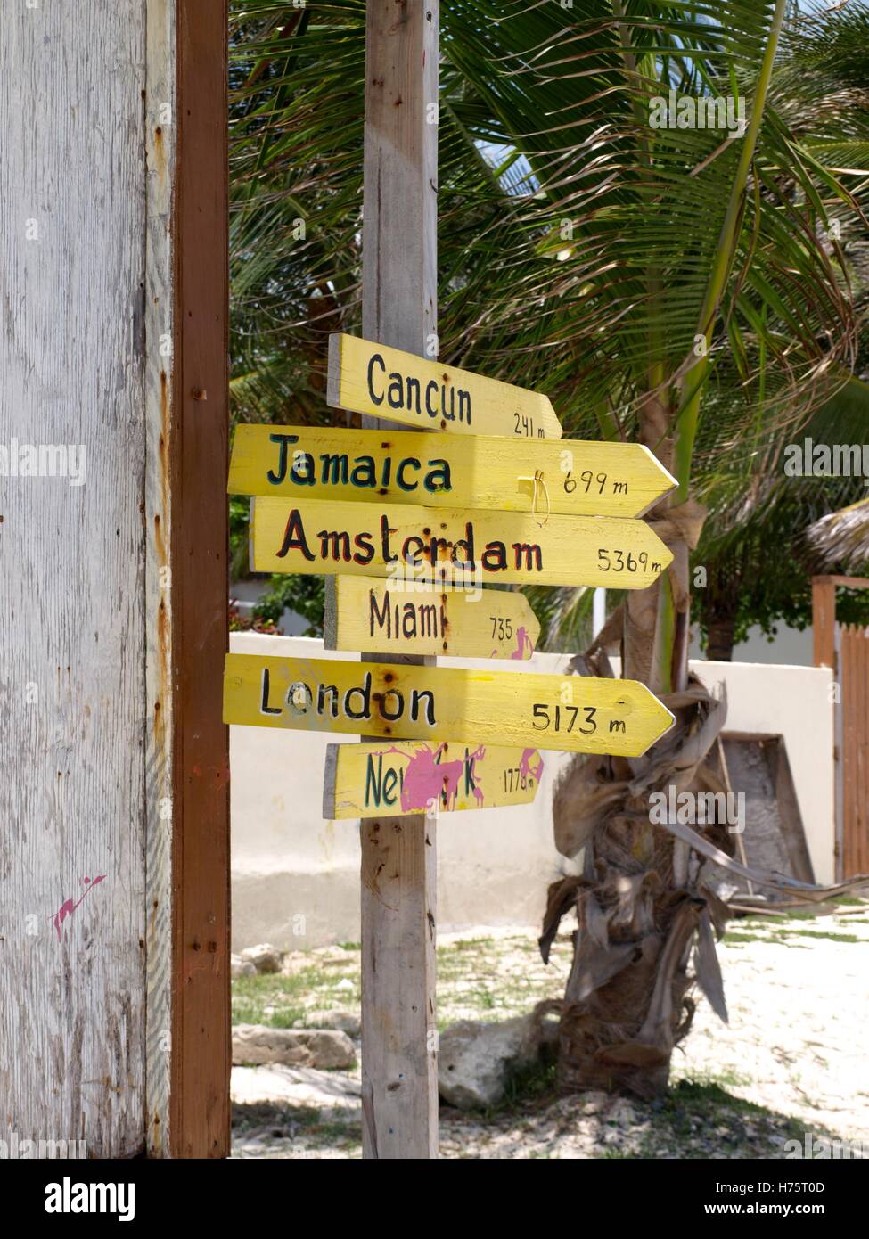 Travel sign with multiple destinations and distances Stock Photo - Alamy