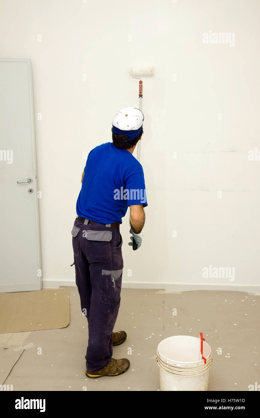 house painter at work in a house Stock Photo - Alamy