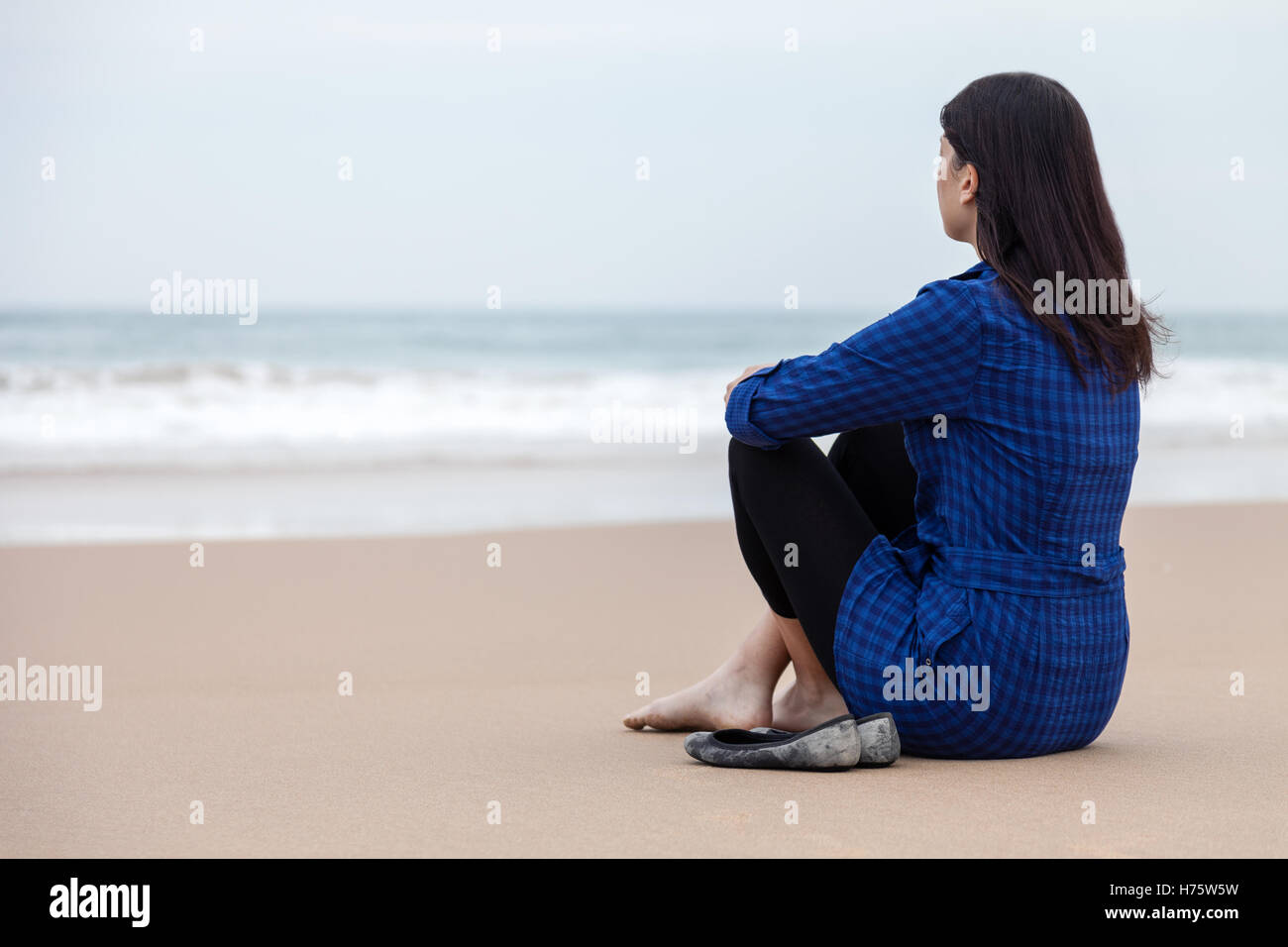 Sad Girl Alone In Beach