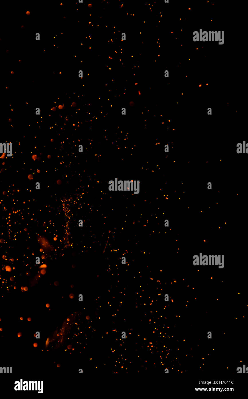 Abstract background from ember sparks against a dark night sky Stock ...