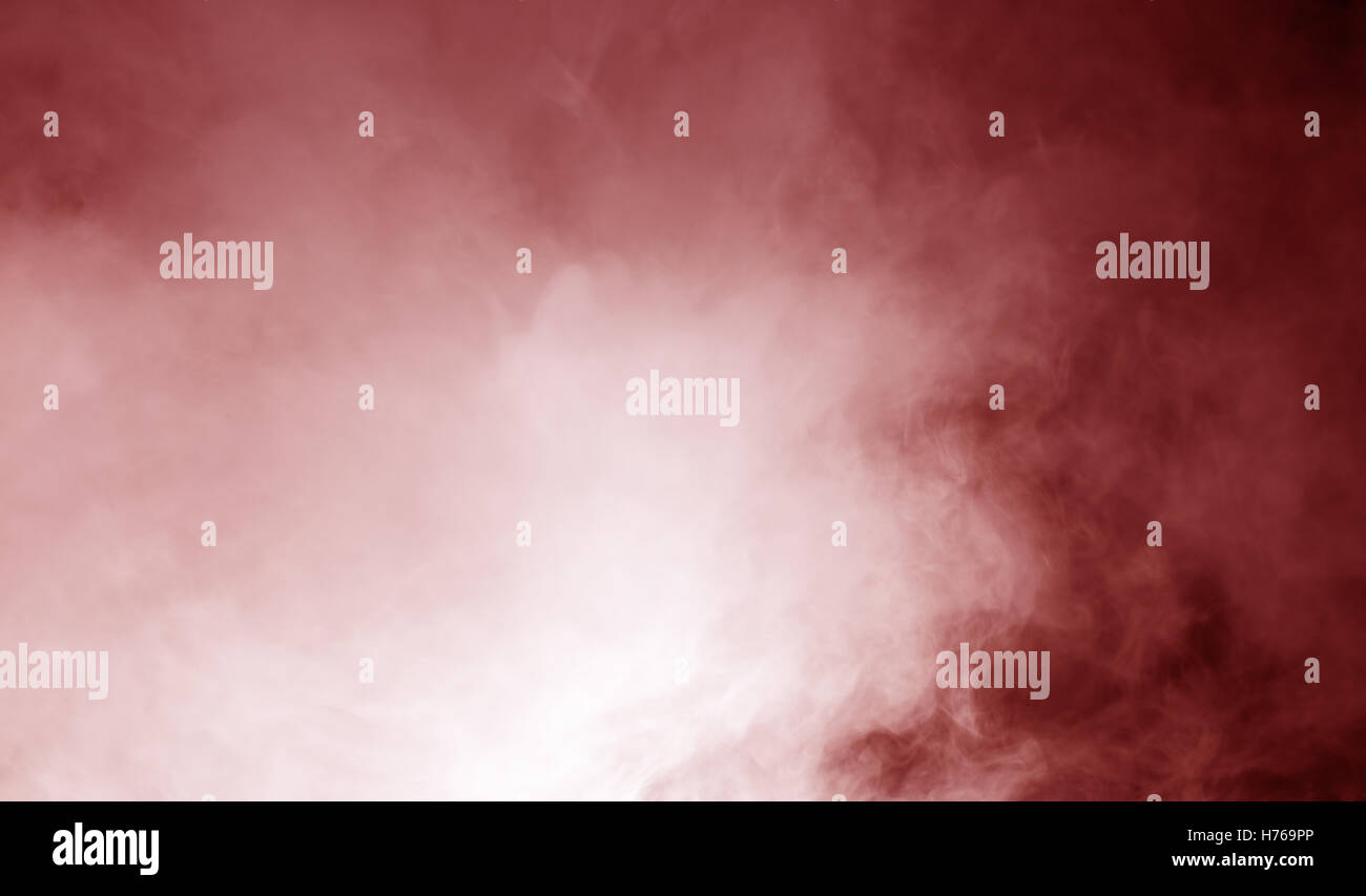 steam on the red background Stock Photo - Alamy