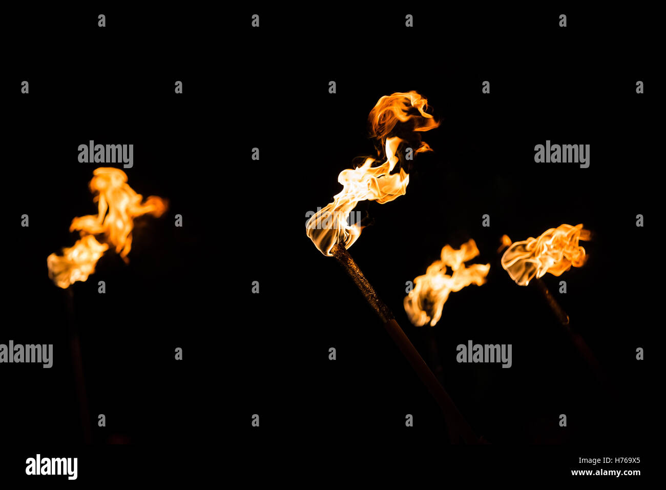 flaming torches at night Stock Photo - Alamy