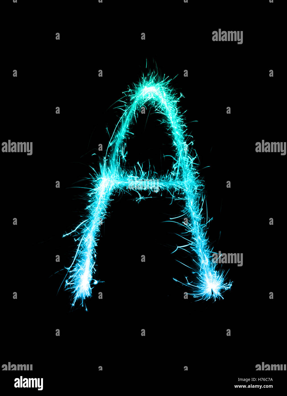 Sparkler firework light alphabet A (Capital Letters) at night ...