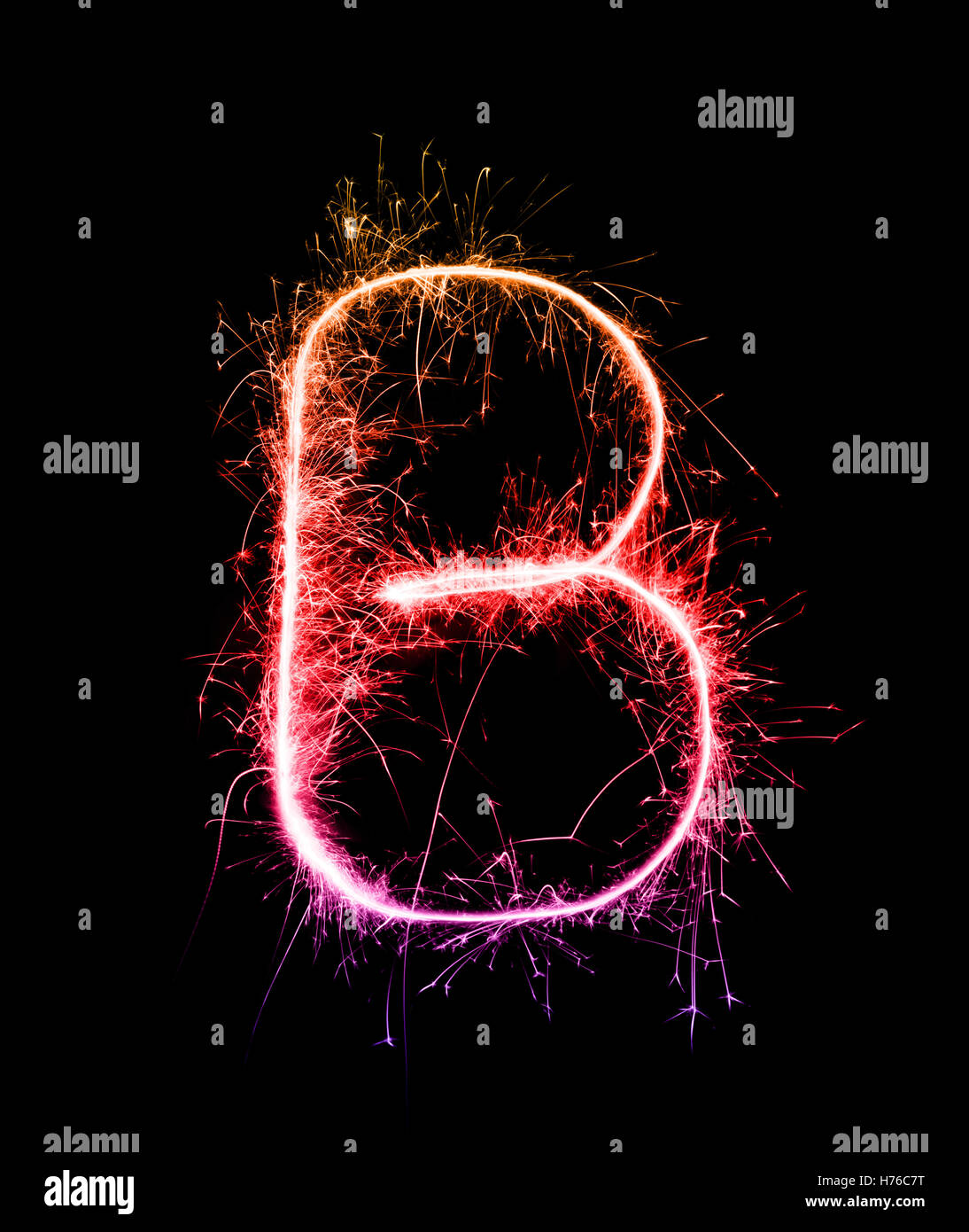 Sparkler firework light alphabet B (Capital Letters) at night ...