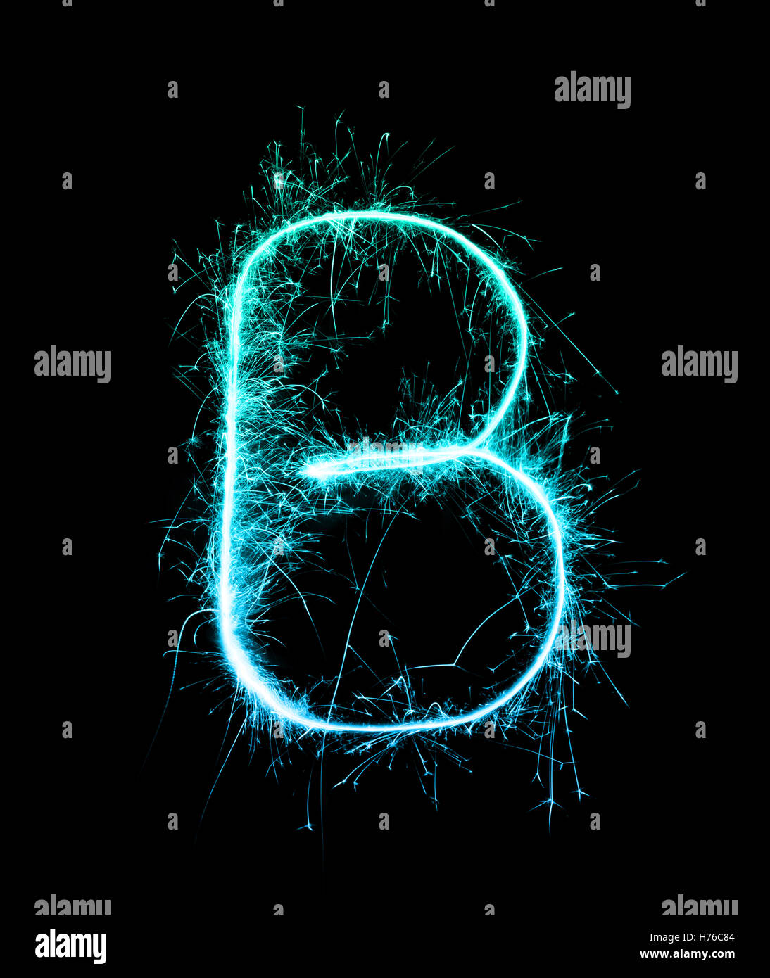 Sparkler firework light alphabet B (Capital Letters) at night ...