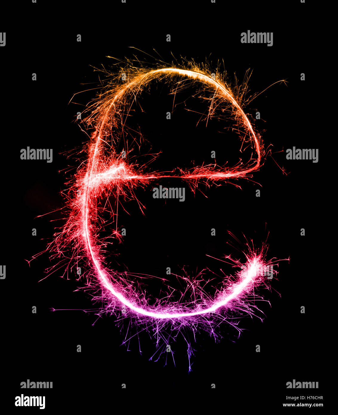 Sparkler firework light alphabet e (Small Letters) at night background ...