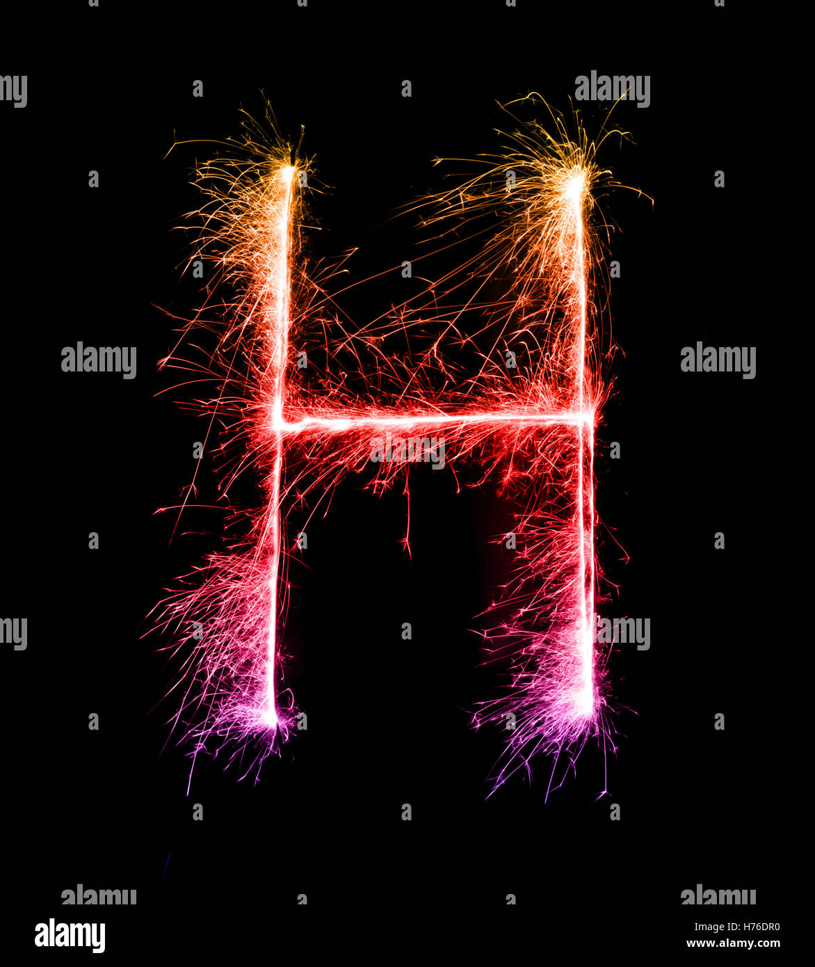 Sparkler firework light alphabet H (Capital Letters) at night ...