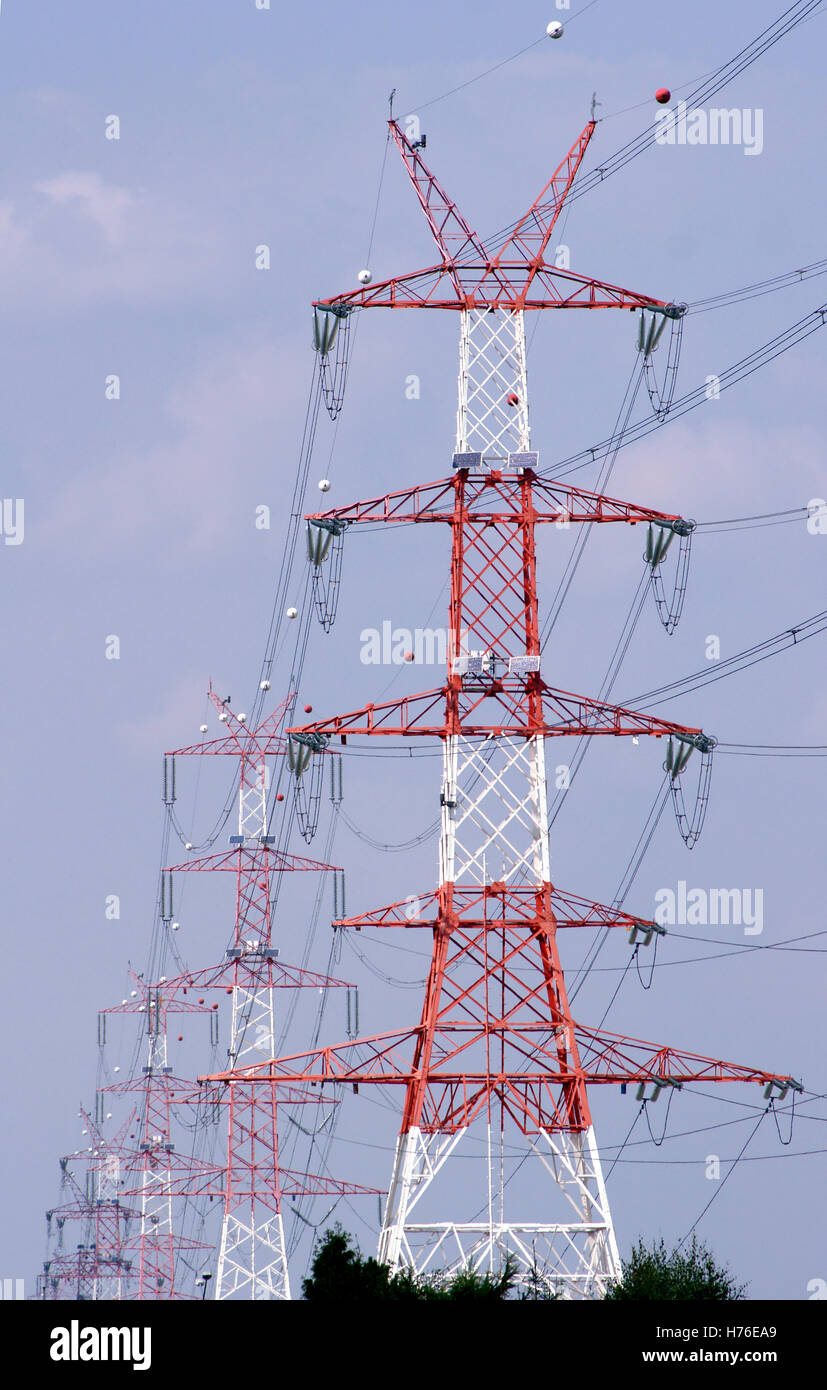 Power lines on a steel pole Stock Photo - Alamy