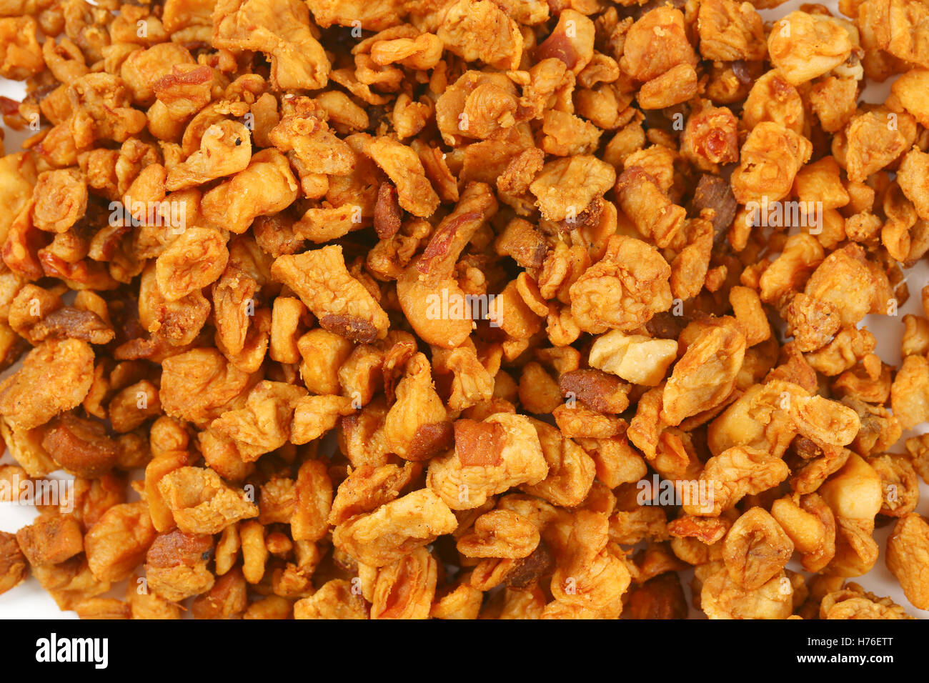 heap of salty pork greaves (top view Stock Photo - Alamy